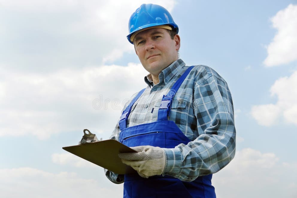Construction Site Manager with Notepad Stock Photo - Image of notepad ...