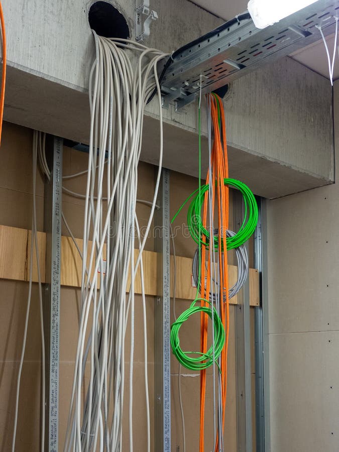 On Construction Site Many Network and Power Cables Hang from the ...
