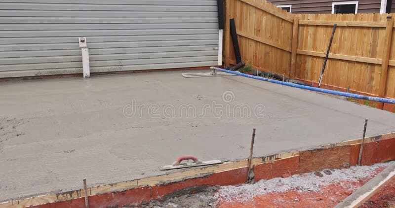 During Construction Site, Mason Levels Screeding Concrete for a ... During Construction Site, Mason Levels Screeding Concrete for a ...