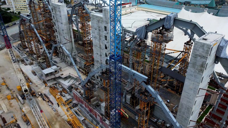 Construction Site with Massive Structures and Construction Equipment ...