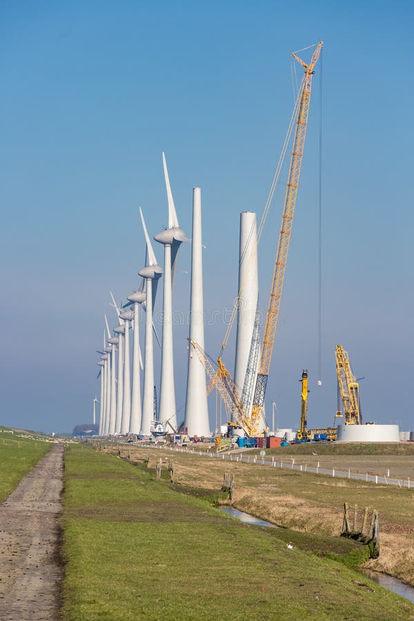 Dutch Wind Turbines Along a Straight Stock Image - Image of efficiency ...