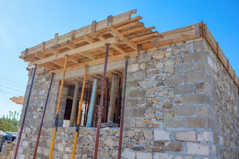 Rustic House Under Construction Stock Photo - Image of frame, exterior ...