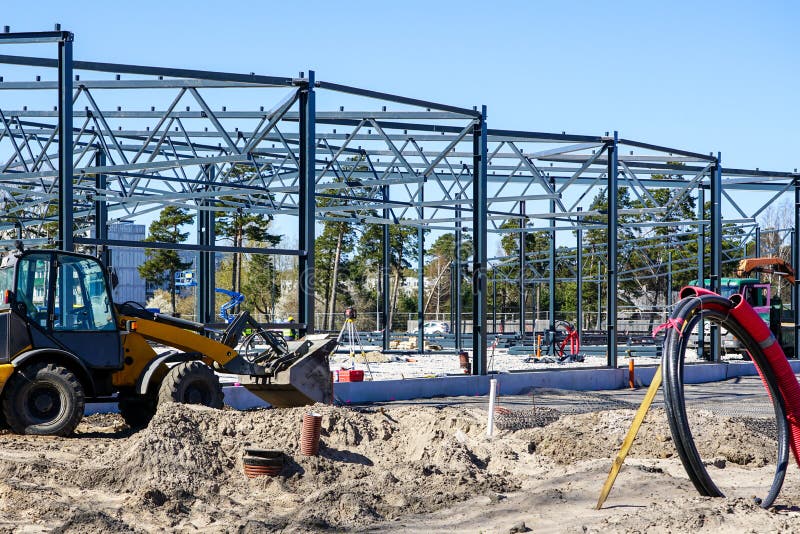 In the Construction Site New Steel Structure is Under Construction ...