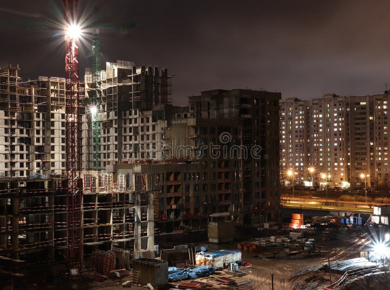 Construction site at night stock image. Image of tower - 106271109