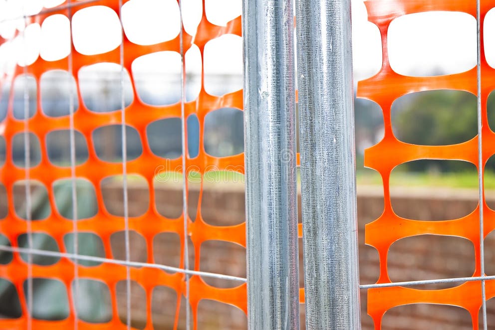Construction Site with Orange Plastic Safety Grid Stock Image - Image ...