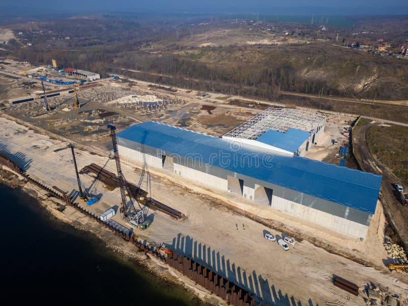 A Construction Site with a Partially Built Warehouse Featuring a Steel ...