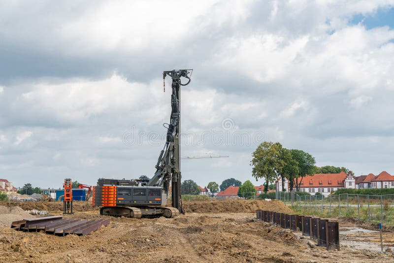 Construction Site with Piling Machine. the Sky Was Covered with White ...