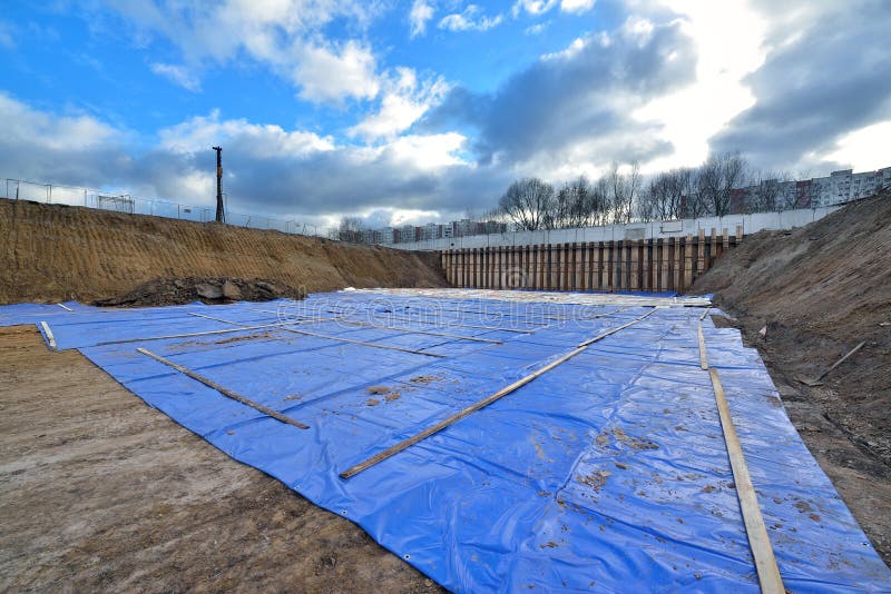Construction Site; Construction Pit with Metal Pipes Supporting Stock ...