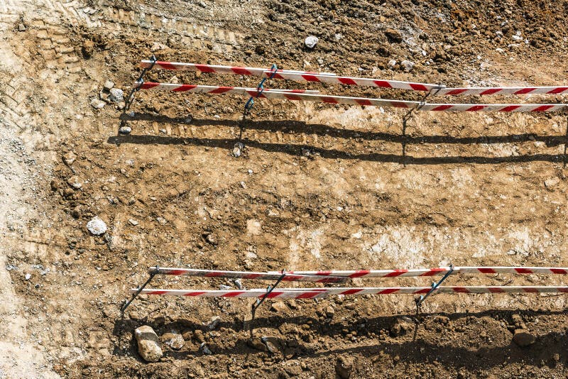 Construction Site Preparation with Safety Barriers Installed on Dirt ...