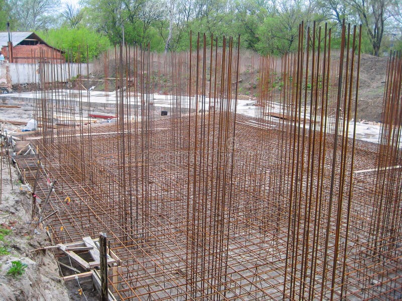Construction Site with Reinforced Foundation Slab and Column Rebar ...
