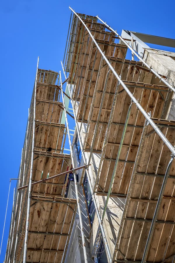 Scaffolding on a New Building Stock Photo - Image of material ...