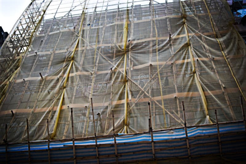 Construction Site with Scaffolding and Protective Mesh Stock Photo ...