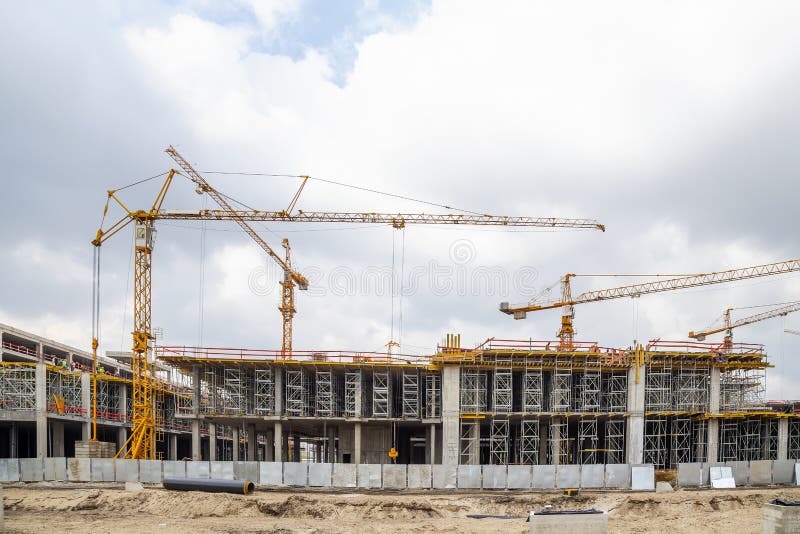 Construction Site of Shopping Mall with Cranes and Workers Stock Photo ...