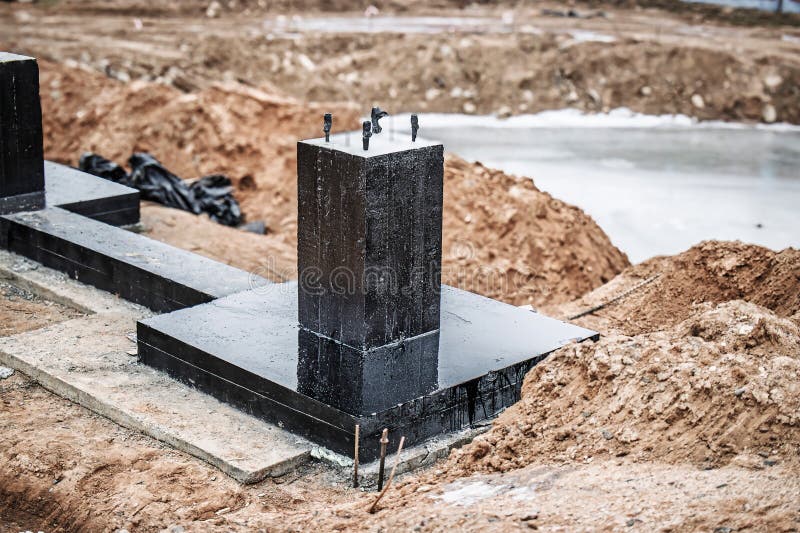Construction Site Showcasing Sturdy Foundation Pillars Amidst Earthy ...