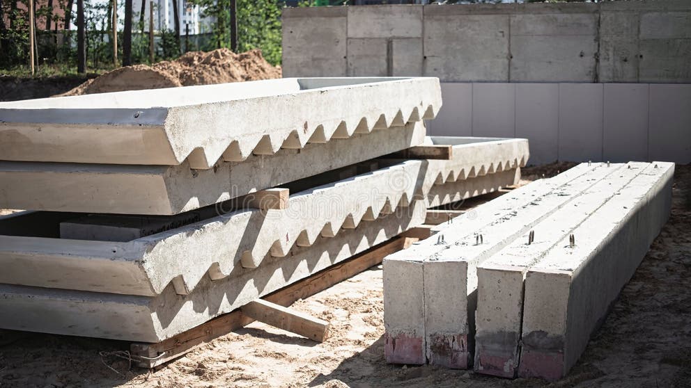 Construction Site Shows Stacked Concrete Slabs in Preparation for ...