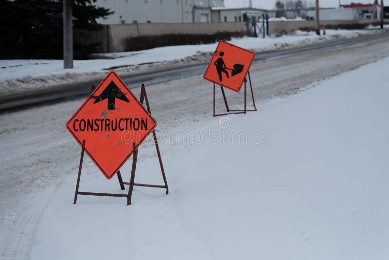 Construction Site Signs on Snow Covered Road Stock Image - Image of ...