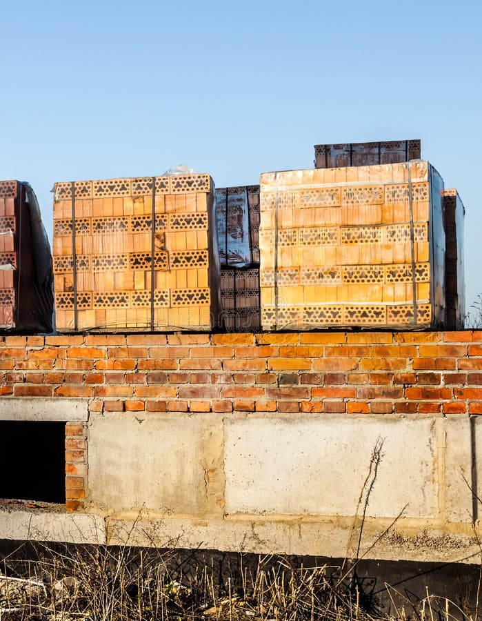 Construction Site. Stacks of Bricks on the Foundation. Stock Image ...