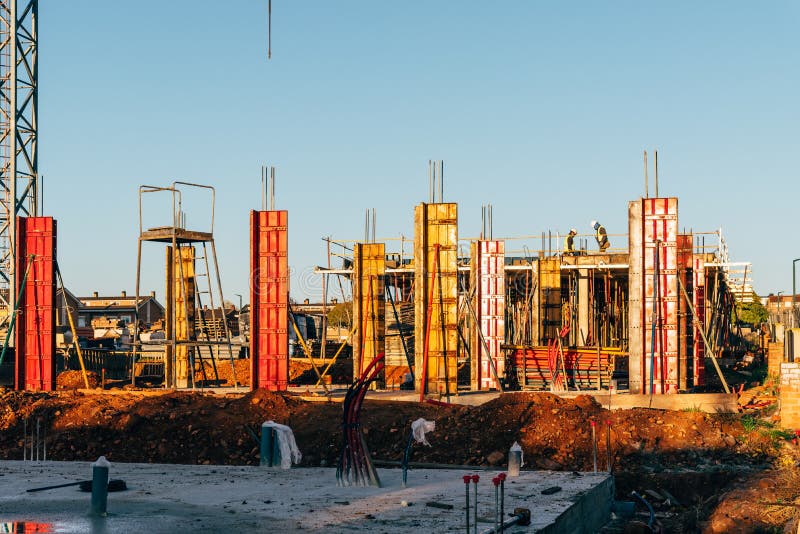 Construction Site with Steel Formworks and Reinforcing Bars for Pillars ...