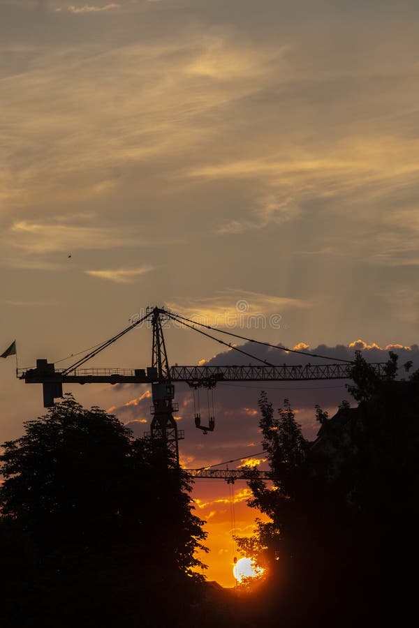Construction Cranes at Sunset Stock Photo - Image of engineering ...