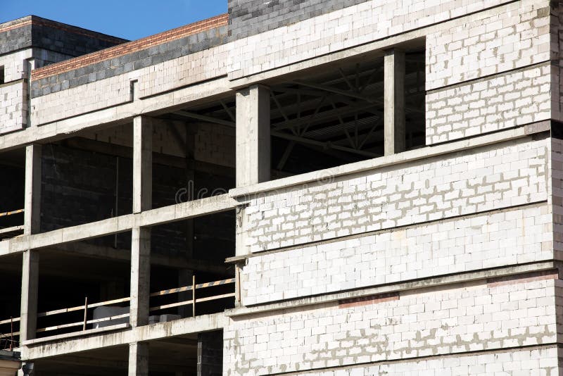 Construction Site and Construction of Tall Building from Blocks Stock ...