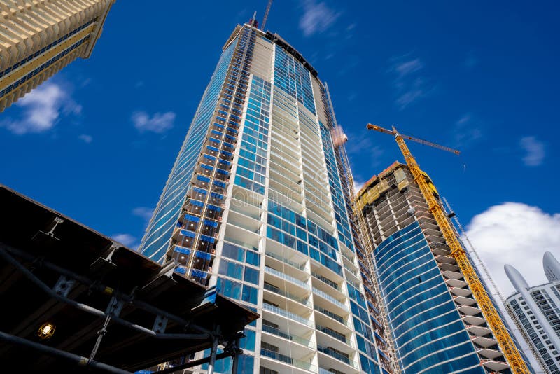 Construction Site with Tall Buildings and Cranes Stock Photo - Image of ...