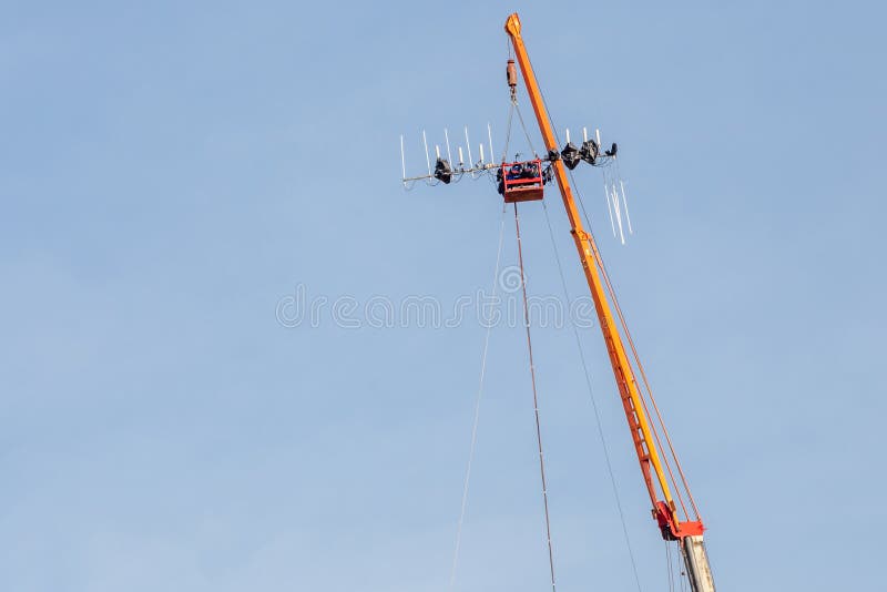 The Construction Site of Telecommunication Tower with Lifting Cr Stock ...
