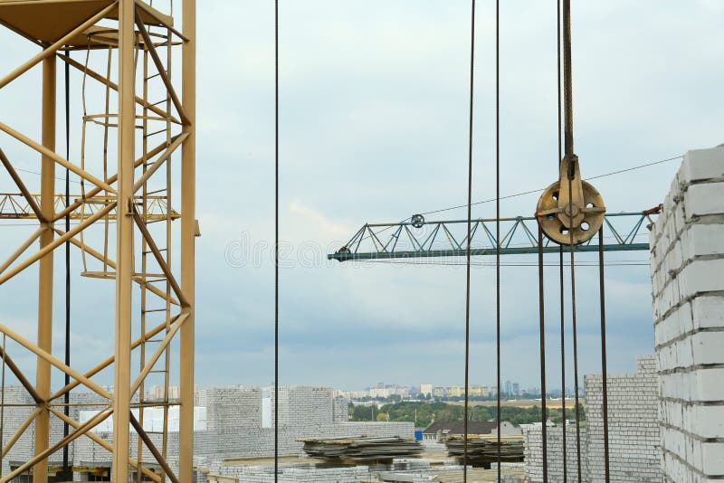 Construction Site with Tower Crane Near Unfinished Building Stock Photo ...