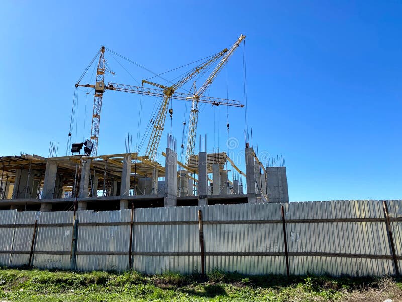 Construction Site with Tower Cranes with Hydraulic Boom Pouring ...