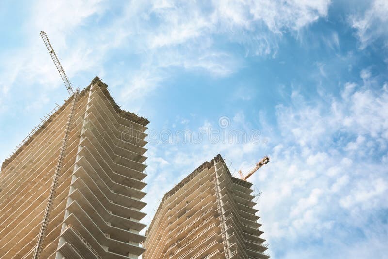 Construction Site with Tower Cranes Near Unfinished Buildings, Low ...