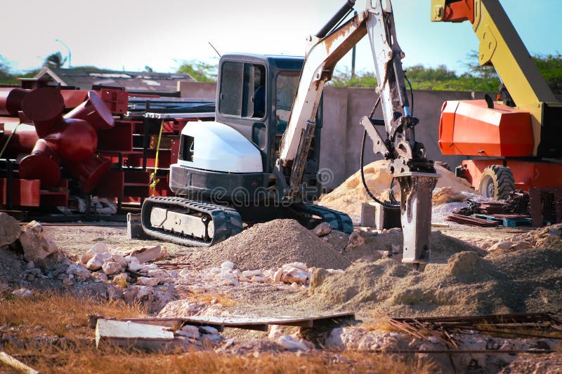 A Construction Site with Various Heavy Machinery and Materials with ...
