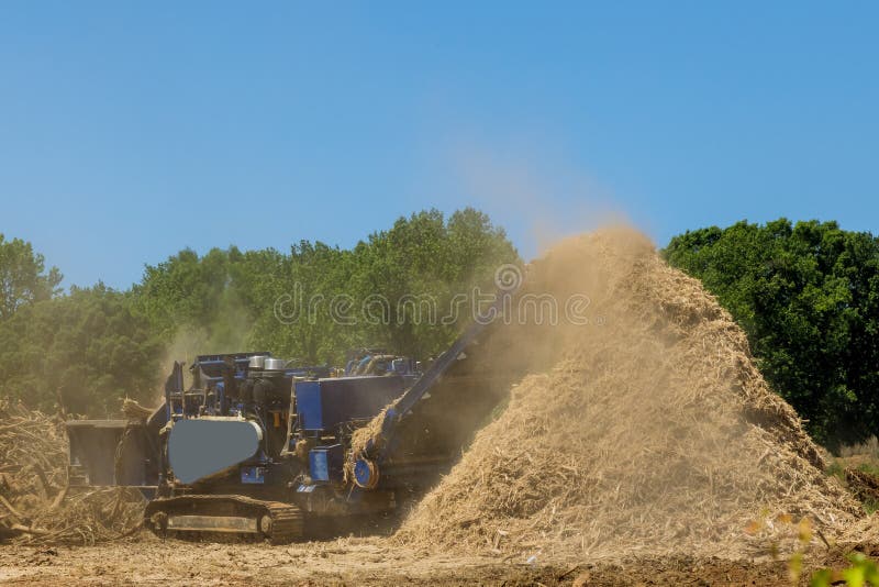 Construction Site with Work Wood Chipping Machine the Chipper Process ...