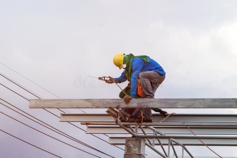 A Construction Workers Installing Beam Formwork. Formwork is Located at ...