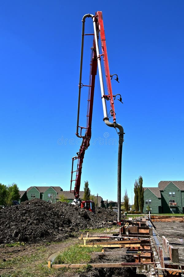 Construction Site with Wet Mud Concrete Being Supplied Stock Photo ...