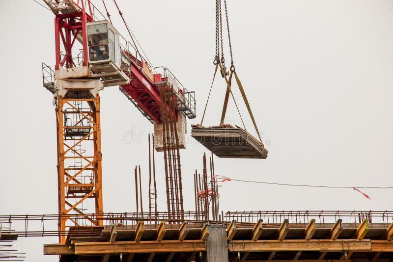 Construction Site. the Worker Performs Work at Height Stock Photo ...
