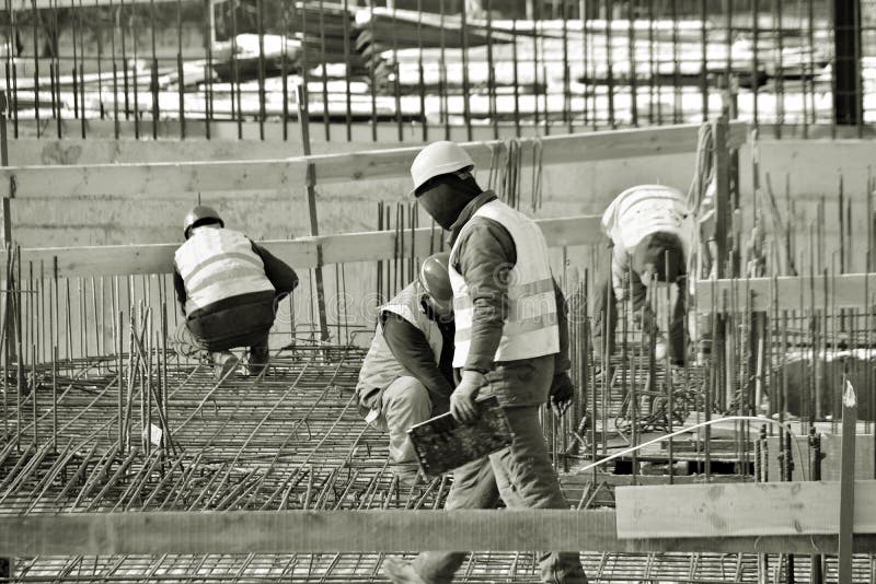 Construction Workers On A Scaffold. Black And White. Stock Photo ...