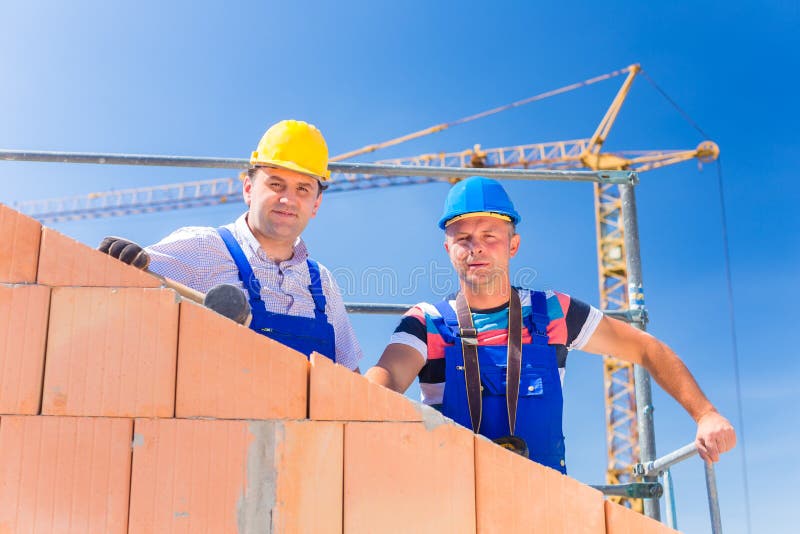 Construction Site Workers Building House with Crane Stock Image - Image ...
