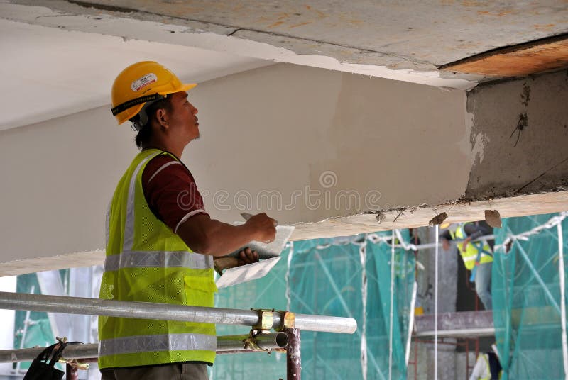 Construction Site Workers are Doing Ceiling Soffit Skim Coat Work at ...