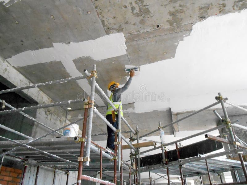 Construction Site Workers are Doing Ceiling Soffit Skim Coat Work at ...
