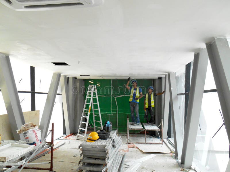 Construction Site Workers are Doing Ceiling Soffit Skim Coat Work at ...