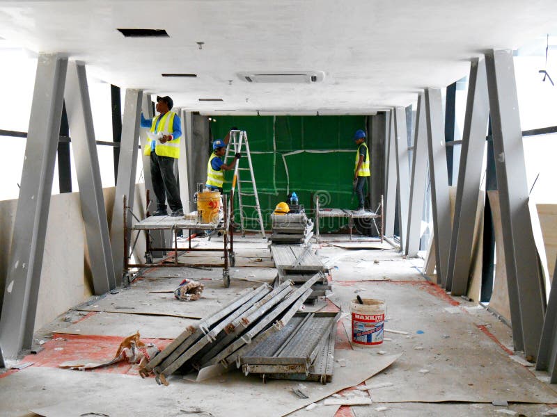 Construction Site Workers are Doing Ceiling Soffit Skim Coat Work at ...