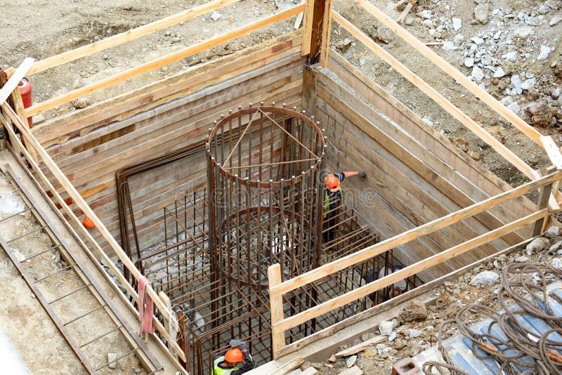 Construction Site. Workers Making a Formwork for a Concrete Column ...