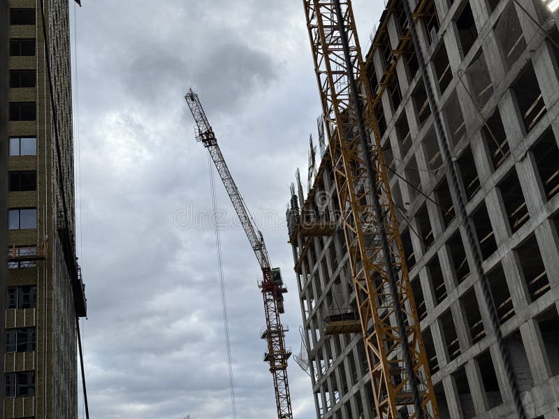 Construction Site with Workers and Tower Cranes Stock Photo - Image of ...