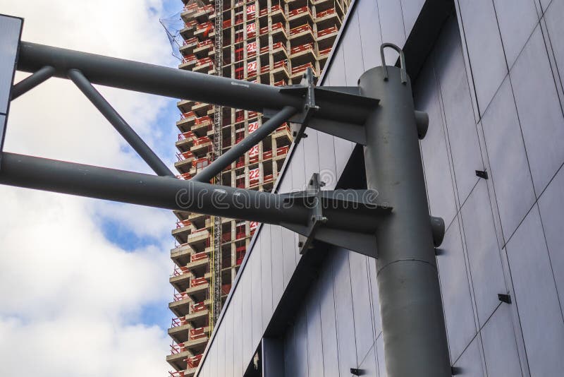 Construction of Skyscraper Tower Crane Lifting of Concrete Plinths ...