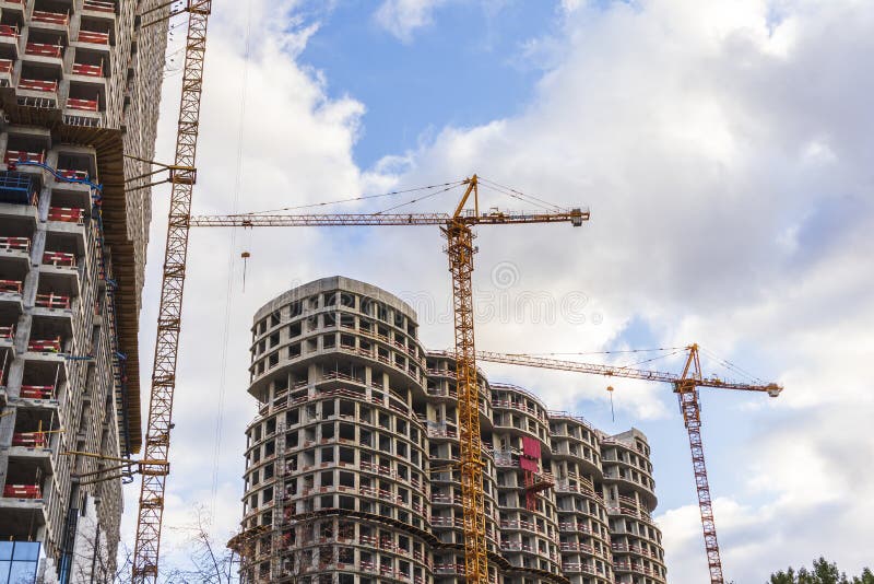 Construction of Skyscraper Tower Crane Lifting of Concrete Plinths ...