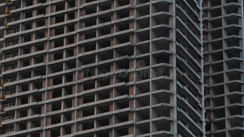 Construction of a Skyscraper, Unfinished Frame of Concrete Building ...