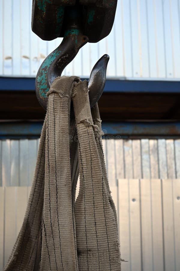 Construction Slings are Thrown Over the Metal Hook of the Crane. Stock ...