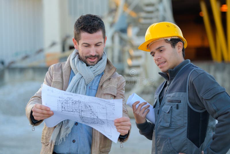 Construction Specialist and Worker Outdoors Stock Image - Image of ...