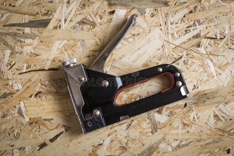 Building stapler close-up stock photo. Image of staple - 100622724