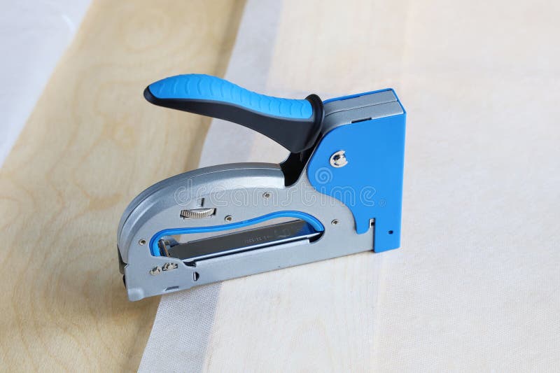 Construction Stapler is on Surface of Material, Close-up Stock Photo ...