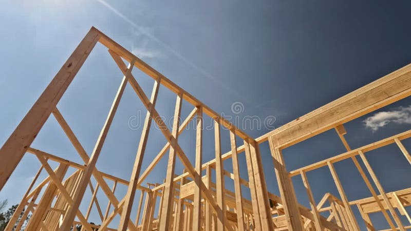 The Construction of a Stick House Involves Assembling Timber Beams into ...